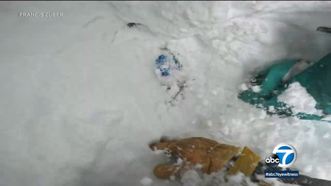 Video shows upside down snowboarder buried alive in snow being saved ...
